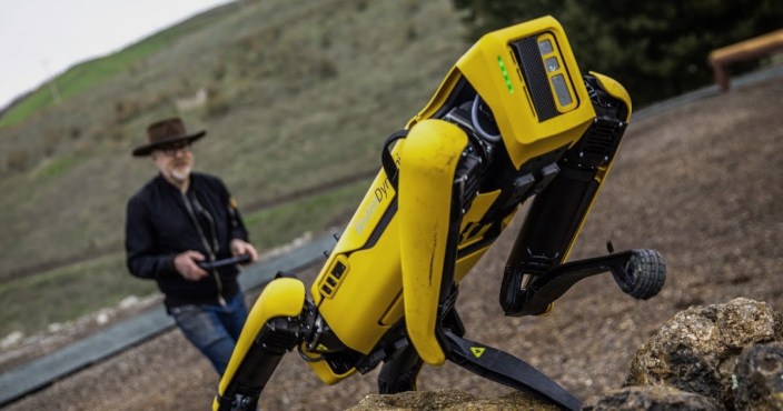 Watch a Boston Dynamics Robot Deftly Toss a Bag of Tools to a ...