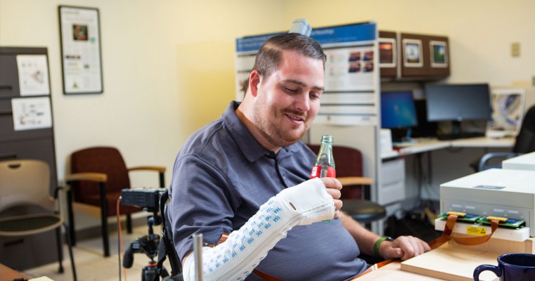 New Mind-Controlled Robot Arm First to Work Without Brain Implant
