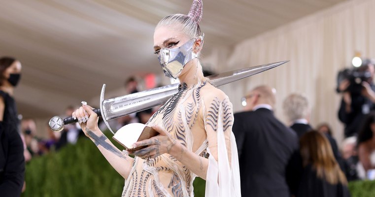 Grimes Brings Sword Made Out of an AR-15 to Met Gala
