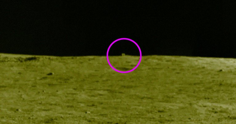 Chinese Rover Exploring What Appears to Be Cube-Shaped Object on Moon