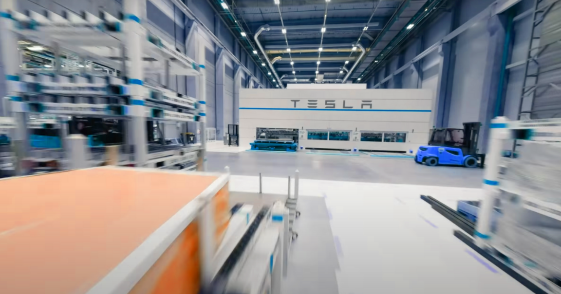 Watch a Drone Fly Directly Through the Tesla Assembly Line