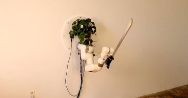 Project Lets Houseplant Control Robot Arm Equipped With Machete