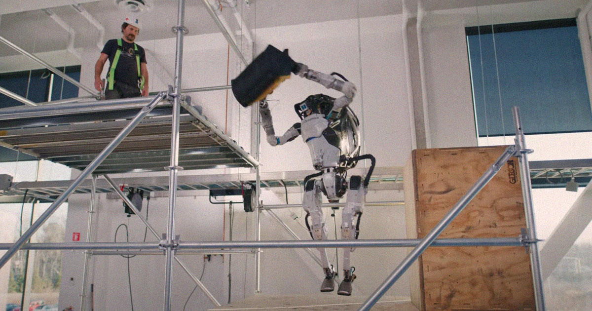 Watch a Boston Dynamics Robot Deftly Toss a Bag of Tools to a ...